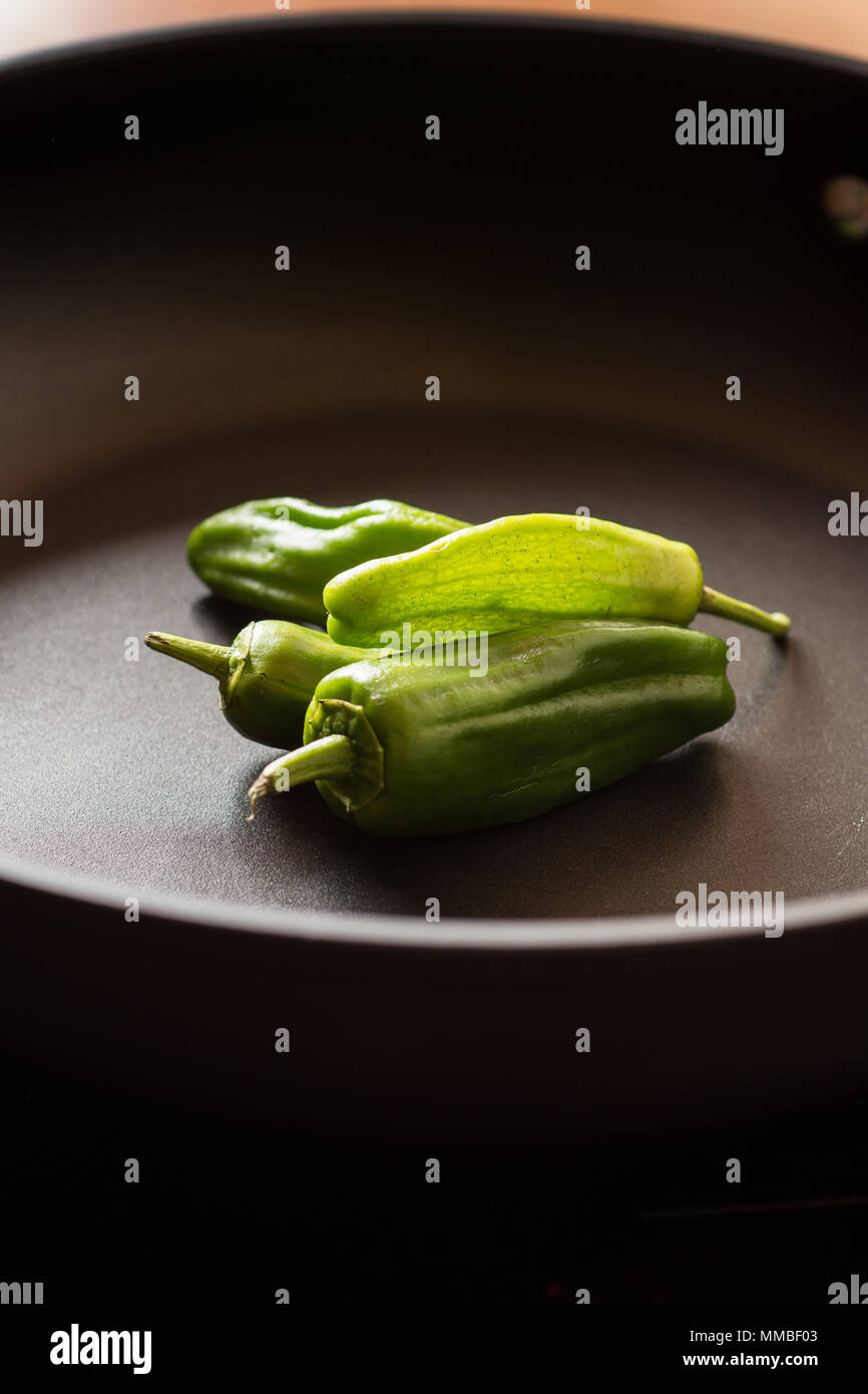 Green Padron Peppers Preparation in the Frying Pan Stock Photo - Alamy