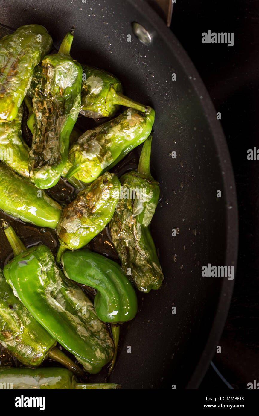 Green Padron Peppers Preparation in the Frying Pan Stock Photo - Alamy