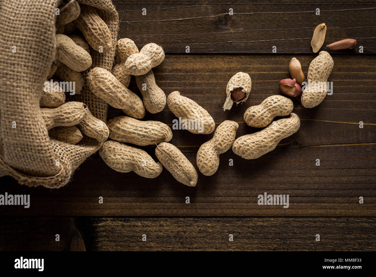 Peanuts in Shells on Wooden Background. Rustic Style Stock Photo - Alamy