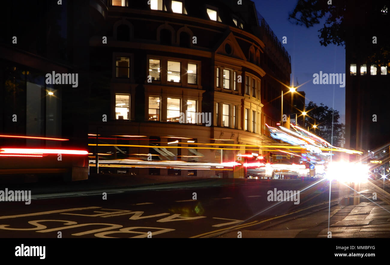 The lights of cars going around the corner of Blagrave Street in ...
