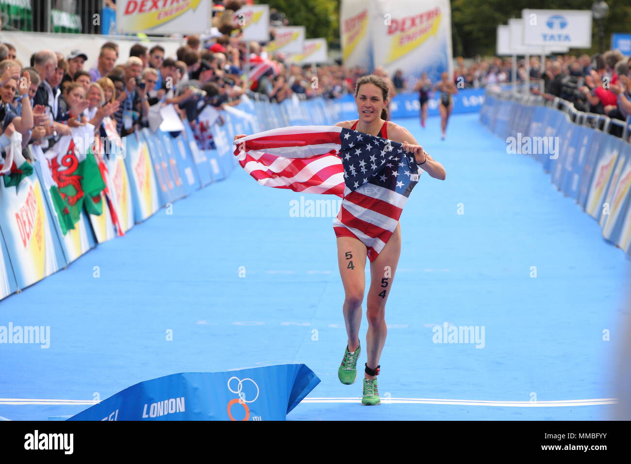 UK - Triathlon - Finish Line - Gwen Jorgensen of the USA crosses the ...