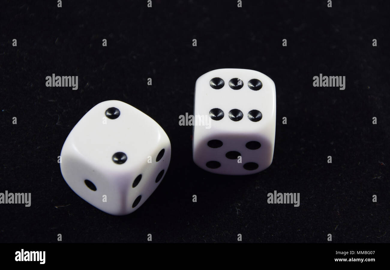 A pair white of dice showing Six and Two Stock Photo - Alamy