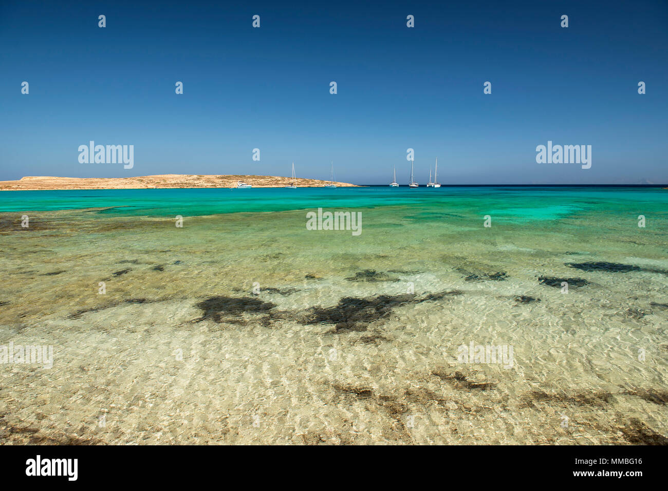 Pori Beach, Koufonissi, Cyclades Island, Greece. The crystal clear sea ...