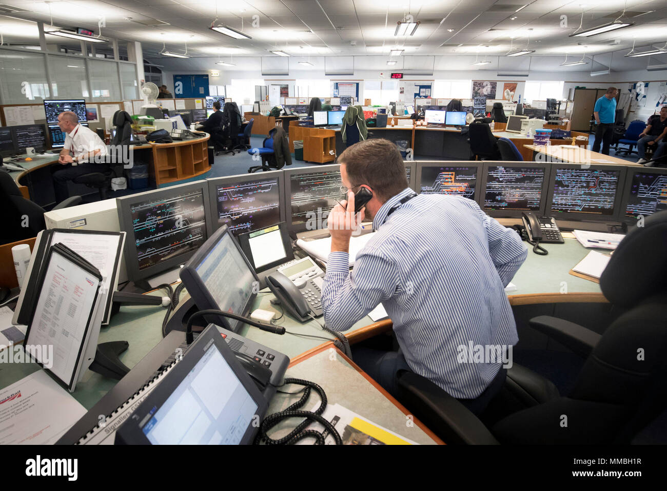 A man works at the Integrated Electronic Control Centre at the Rail ...