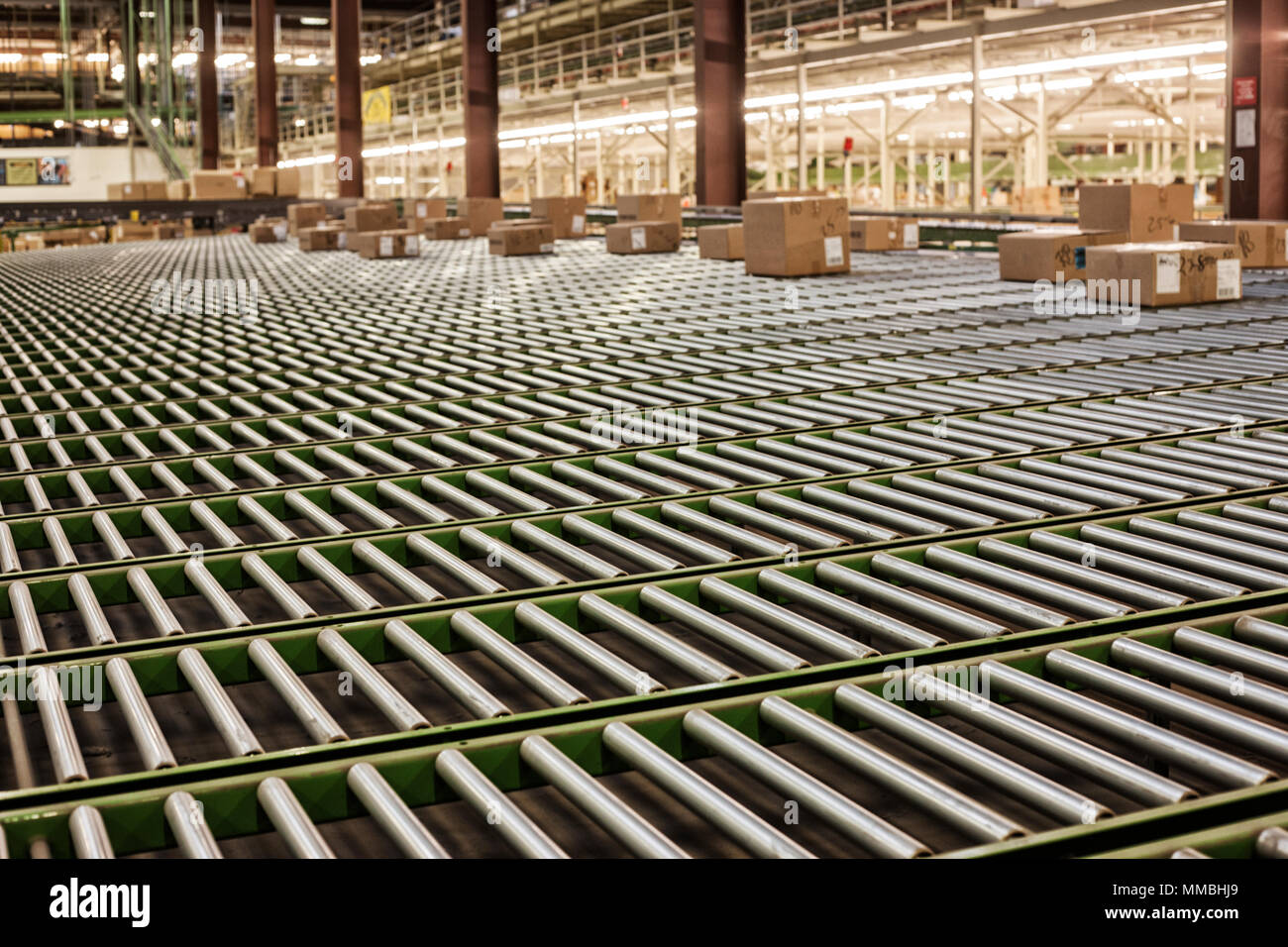 Interior view of a gravity feed conveyor system in a large distribution ...