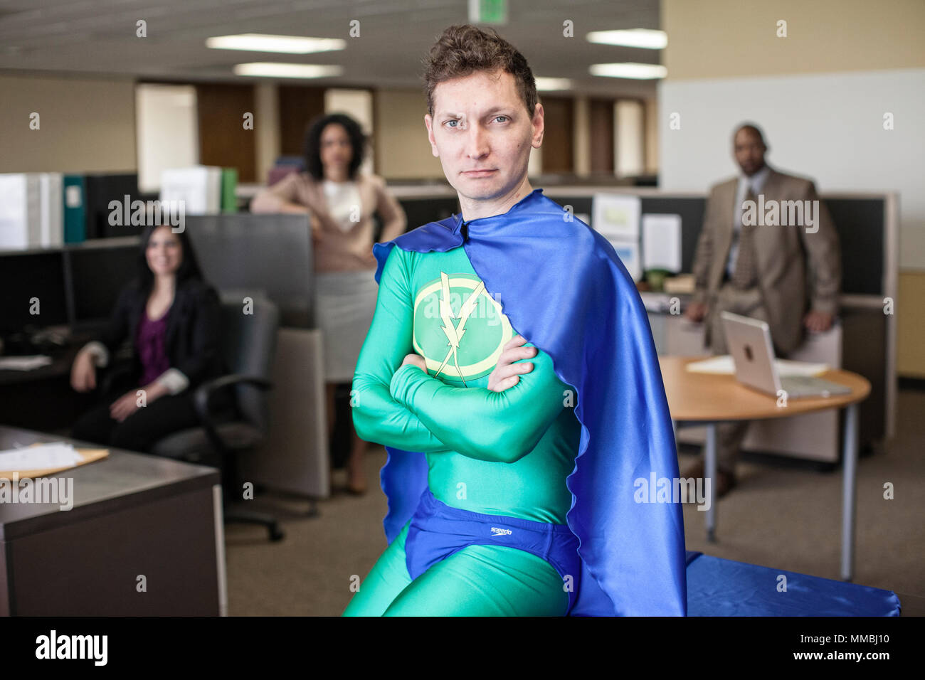 A caucasian businessman office super hero and his office staff Stock ...
