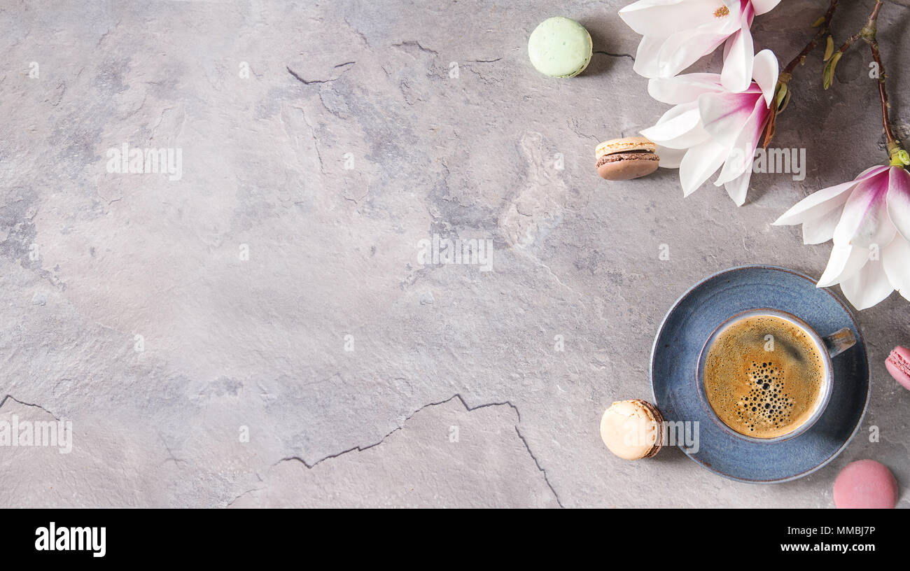 Coffee with spring flowers Stock Photo - Alamy