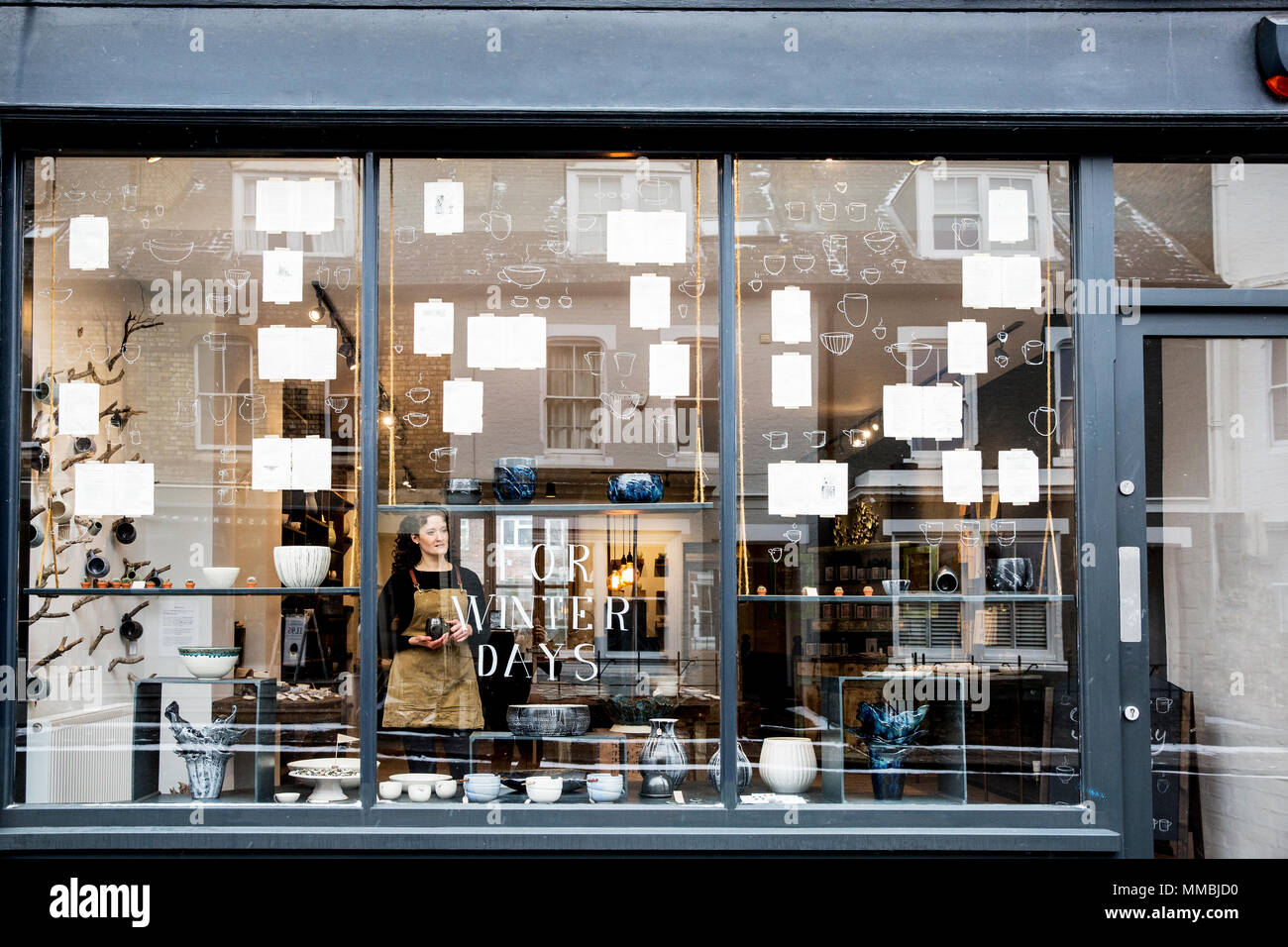 View through window into a pottery shop Stock Photo - Alamy