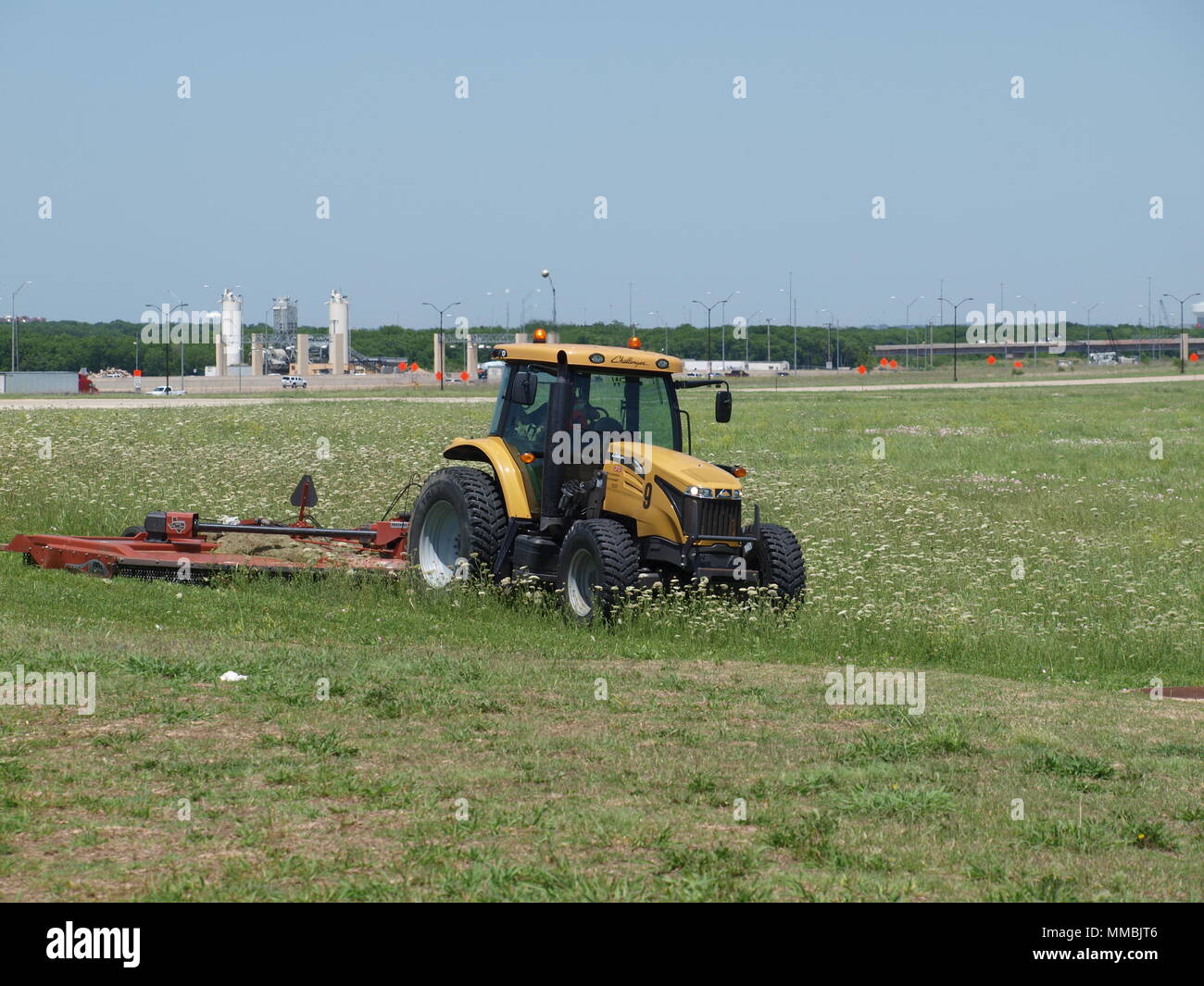 Cutting the Grass in Operational Field at DFW International Stock Photo ...