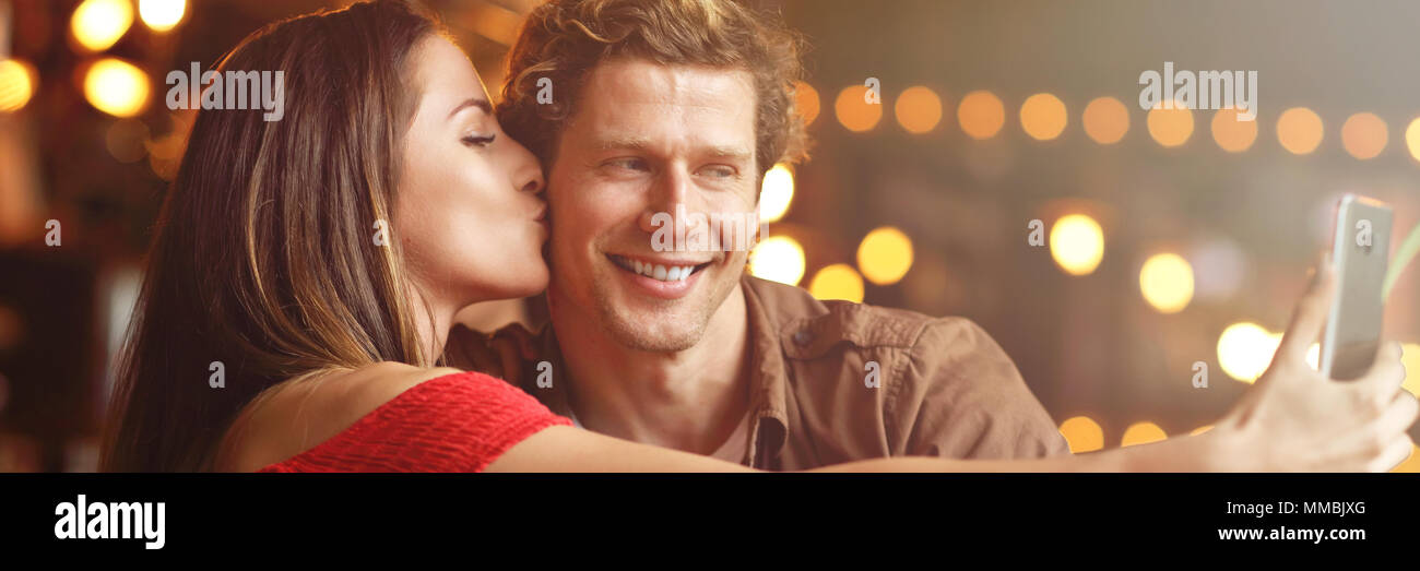 Cute couple on a date at the cafe Stock Photo - Alamy