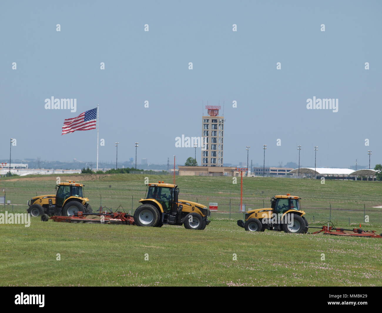 Cutting the Grass in Operational Field at DFW International Stock Photo ...