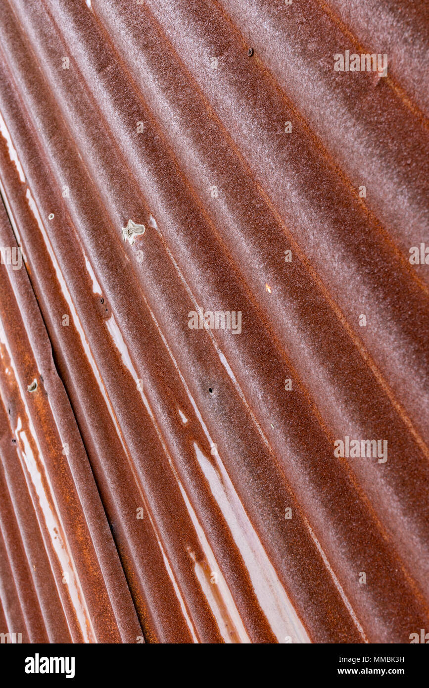 side view Old rusty metal plate Stock Photo - Alamy