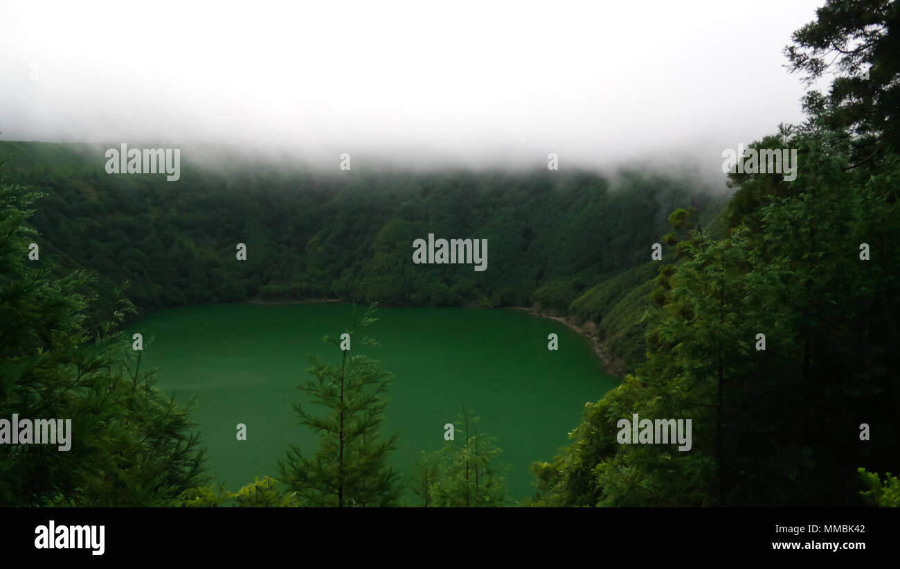 Cloud above green Lake Santiago, Sao Miguel island, Azores, Portugal ...