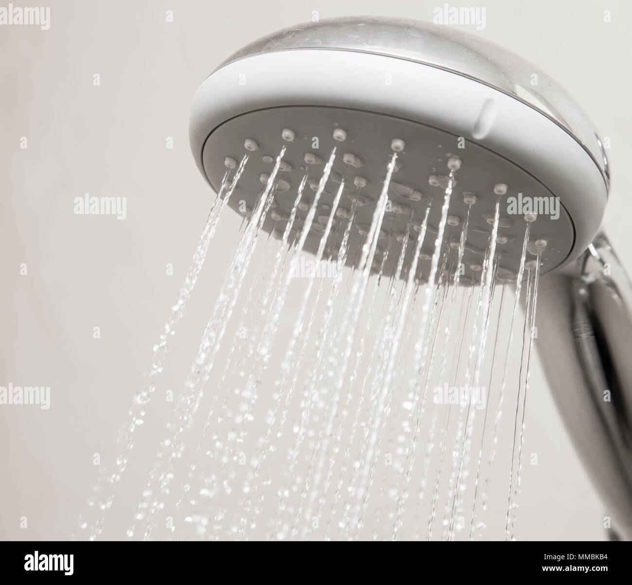 Shower head in bathroom with water drops Stock Photo - Alamy