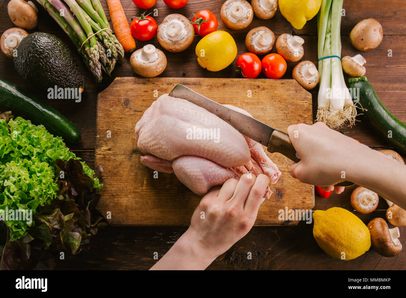 Old woman cutting vegetables on hi-res stock photography and images - Alamy