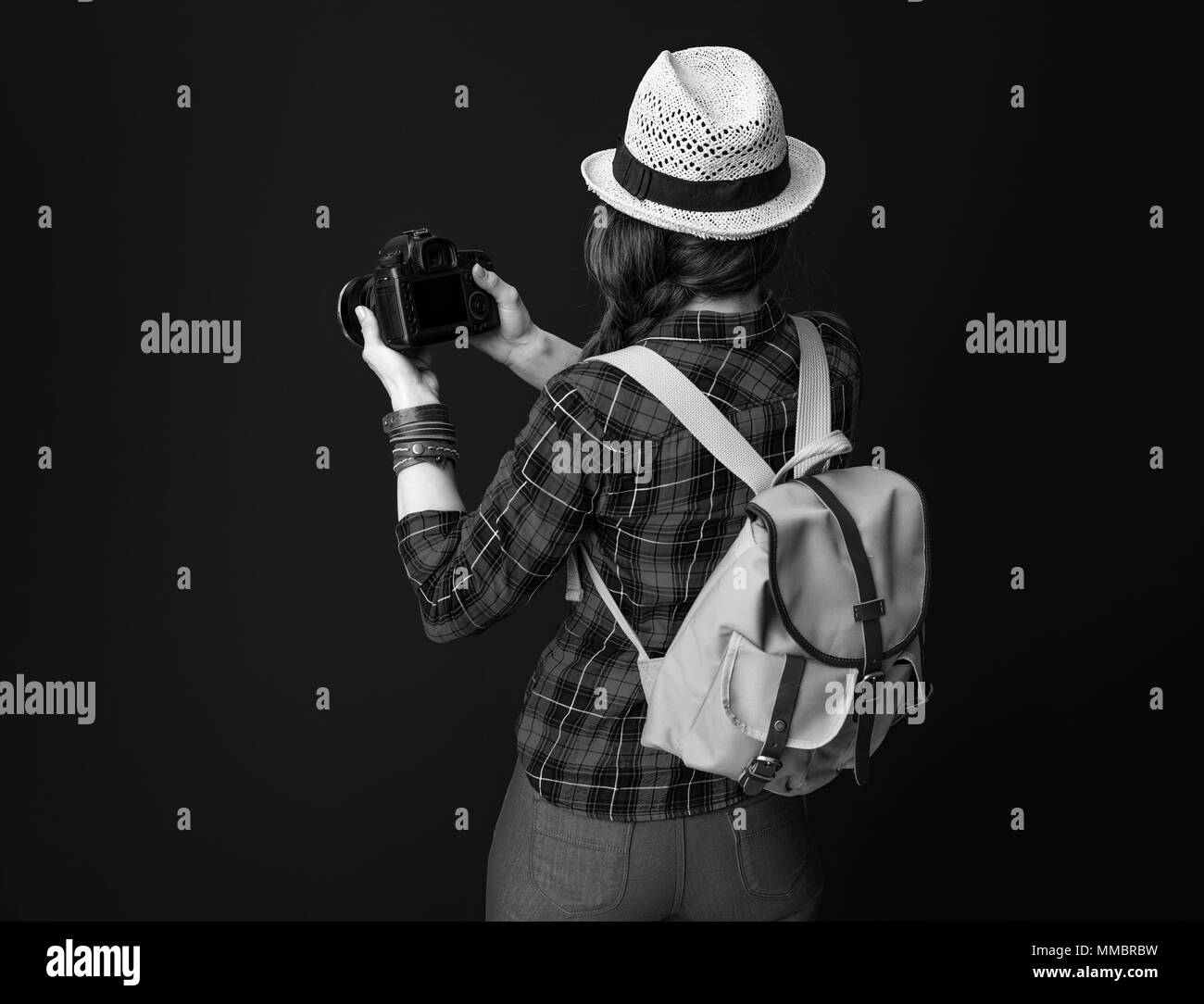 Woman from behind taking Black and White Stock Photos & Images - Alamy