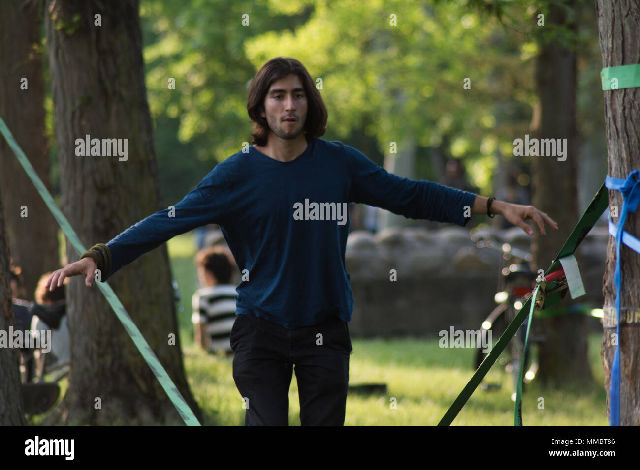 Guy is balancing hi-res stock photography and images - Alamy