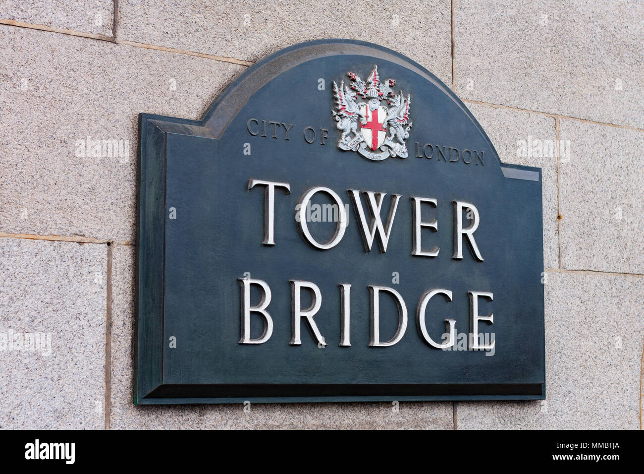 Street sign Tower Bridge on wall in City of London, England Stock Photo ...
