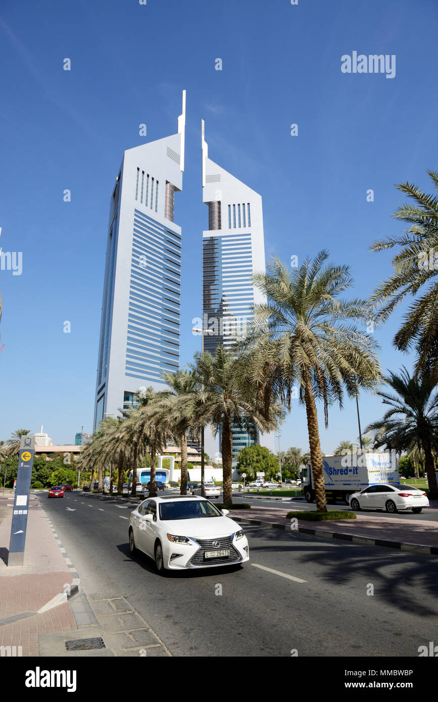 DUBAI, UAE - NOVEMBER 19: The Emirates Towers and Lexus LS car on ...