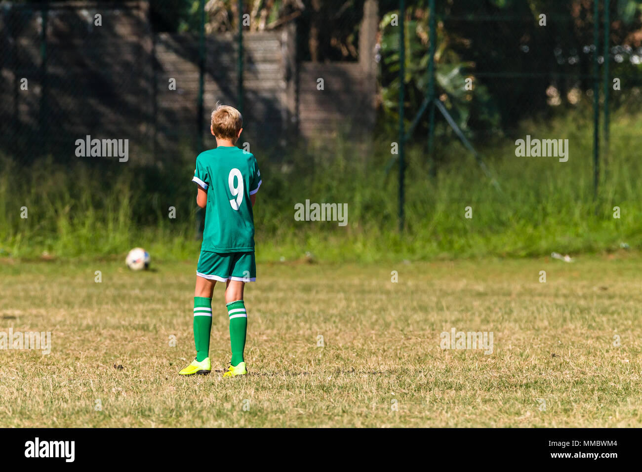 Junior football player hi-res stock photography and images - Alamy
