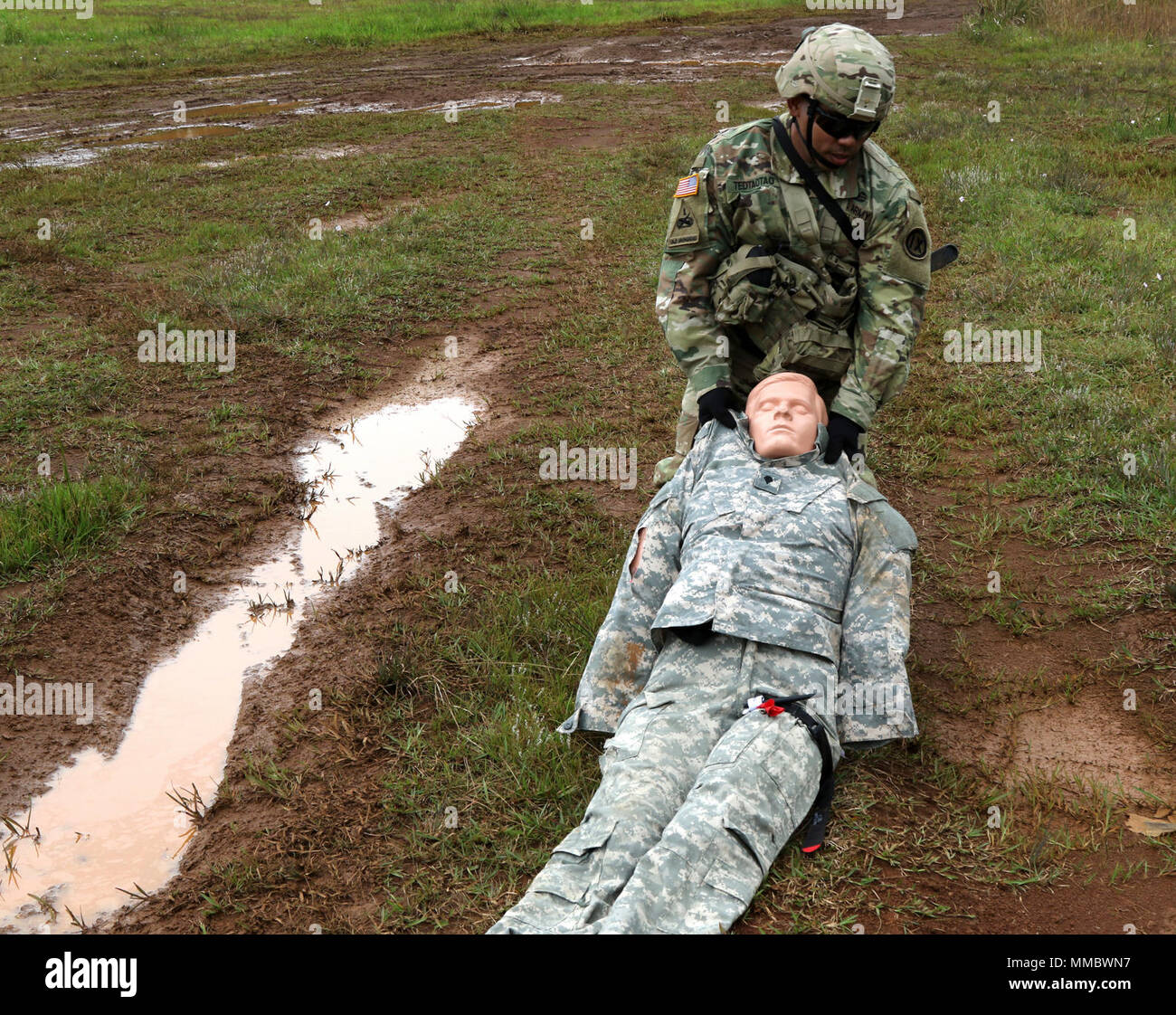 Sgt. Robert F. Tedtaotao of 368th Military Police Company tactically ...