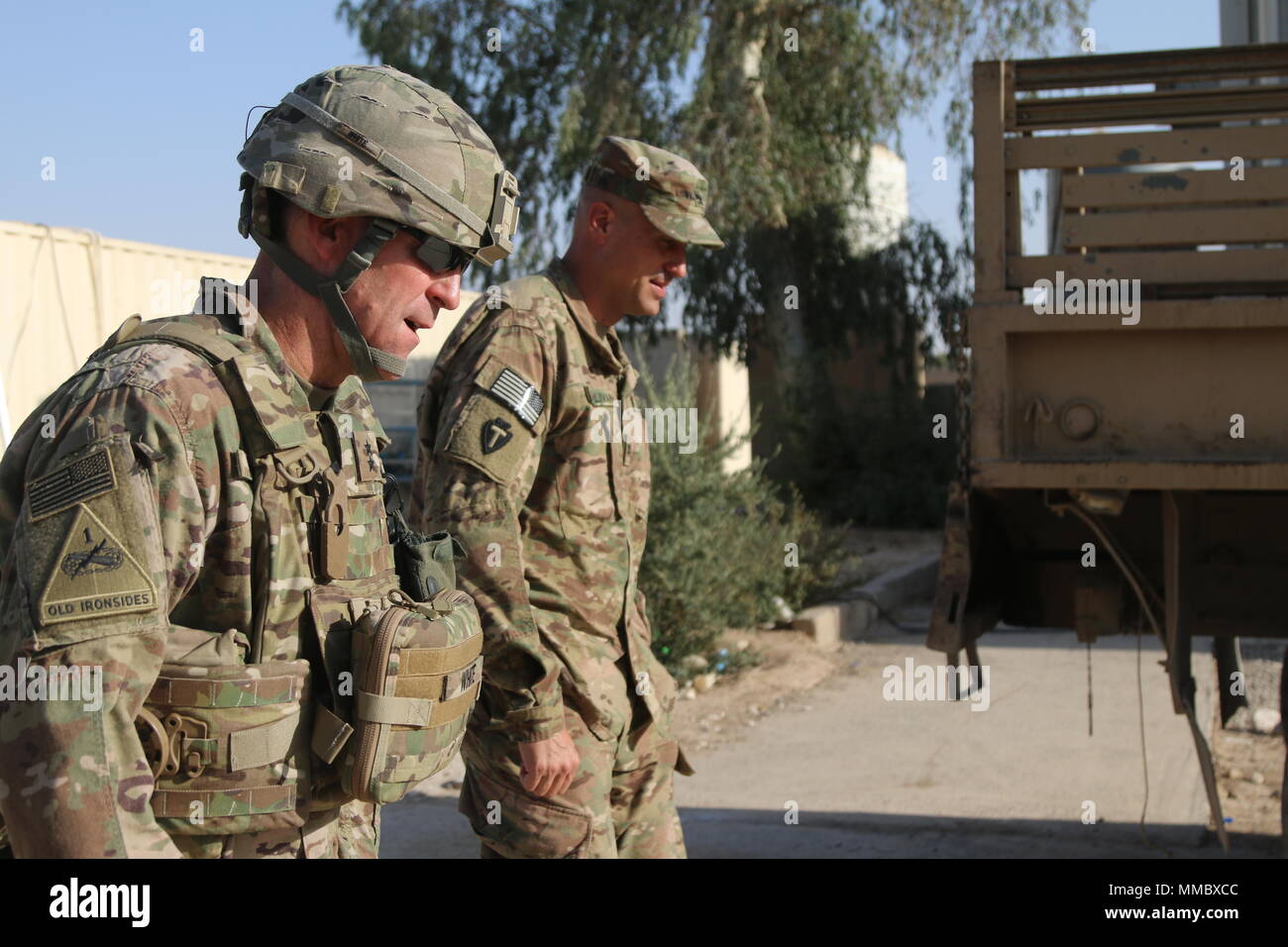 (From left to right) Maj. Gen. Pat White, commanding general of ...
