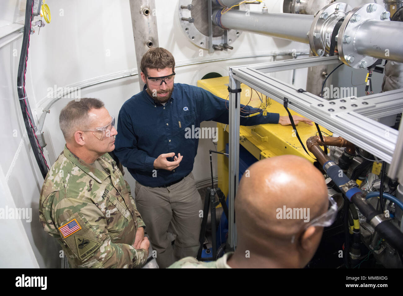 Michael Szedlmayer explains the lab's high-altitude chamber during a ...
