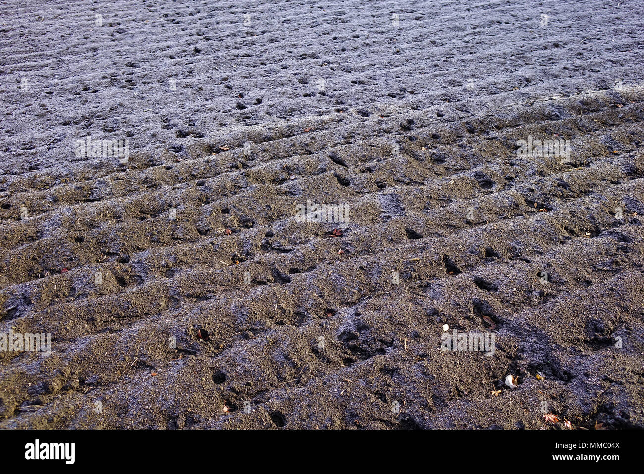 Brown mud in a field that has been plowed Stock Photo - Alamy