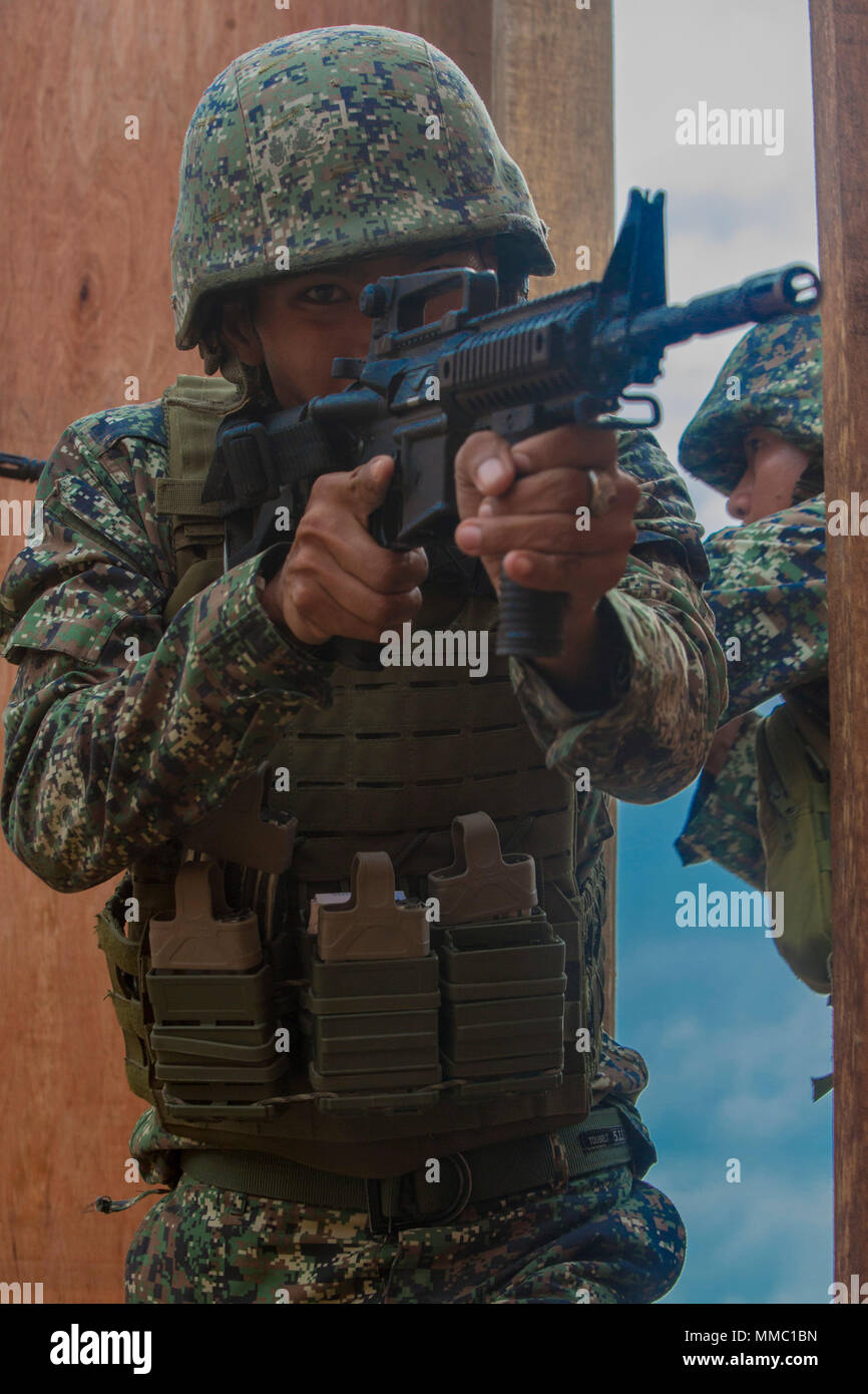 Philippine Marine Corps Sgt. Juanito Merida, native to Romblon ...