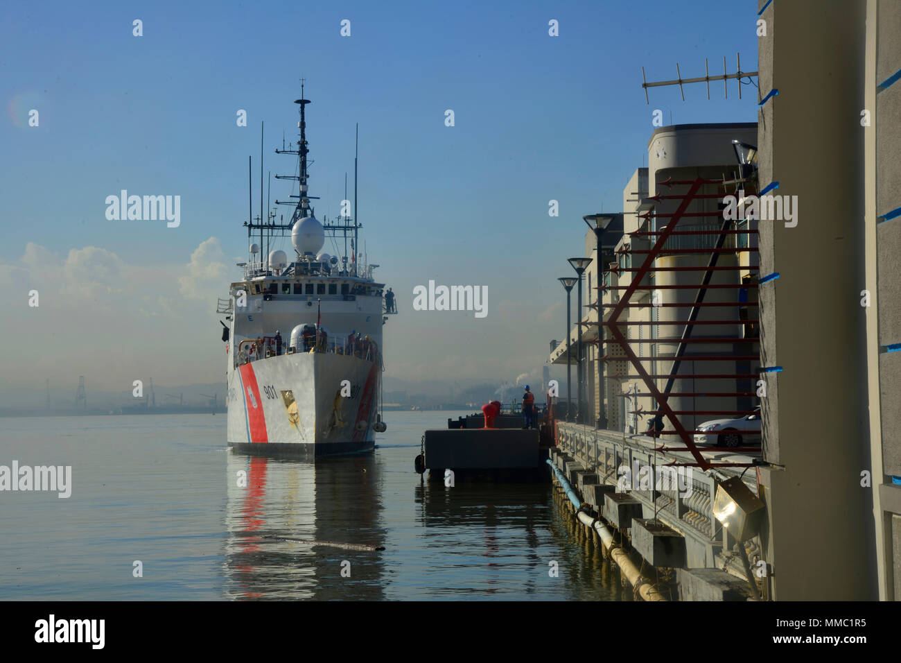 The crew of the Coast Guard Cutter Bear, a 270 foot, medium endurance ...