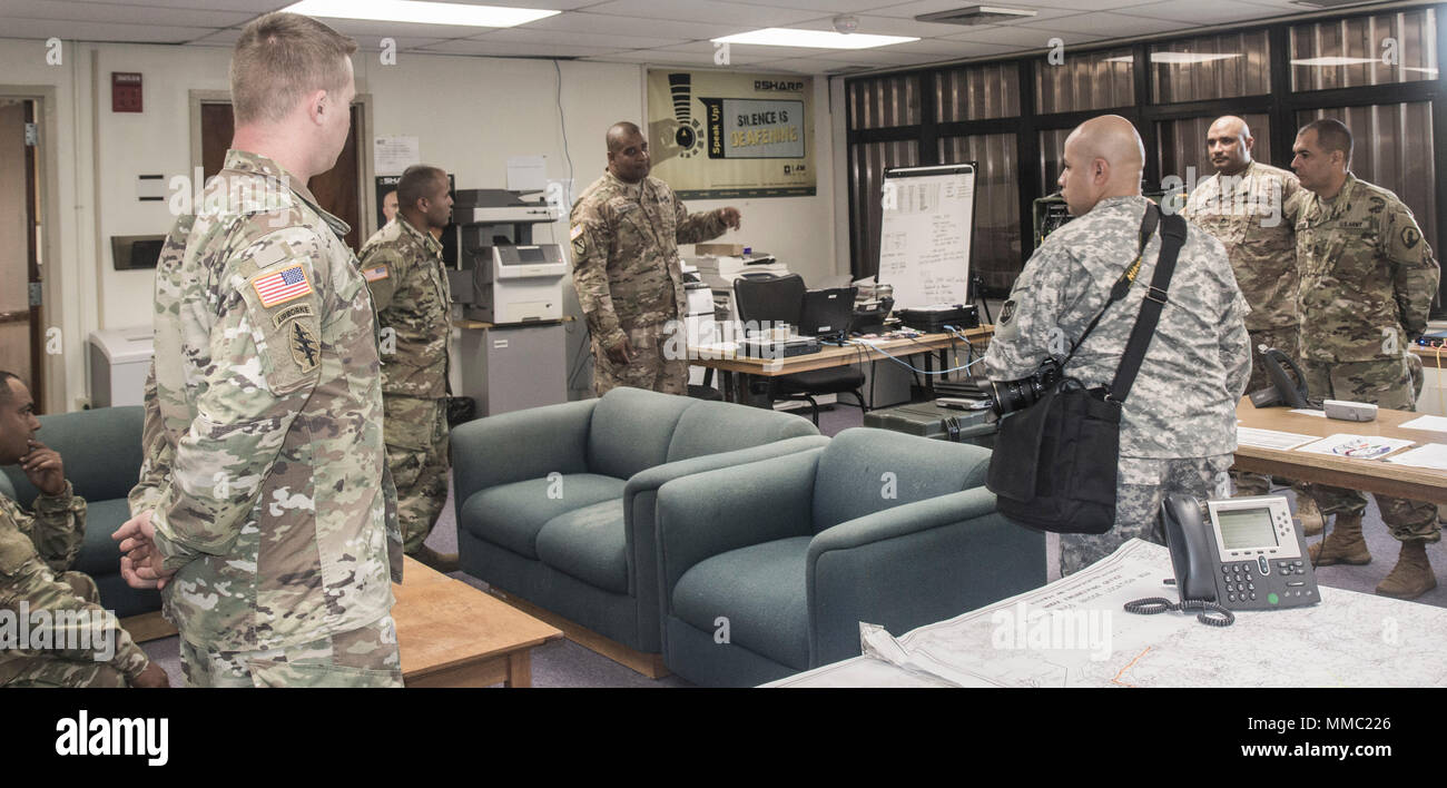 U.S. Army Reserve Staff Sgt. Luis Escalera, explains how Alpha Company ...