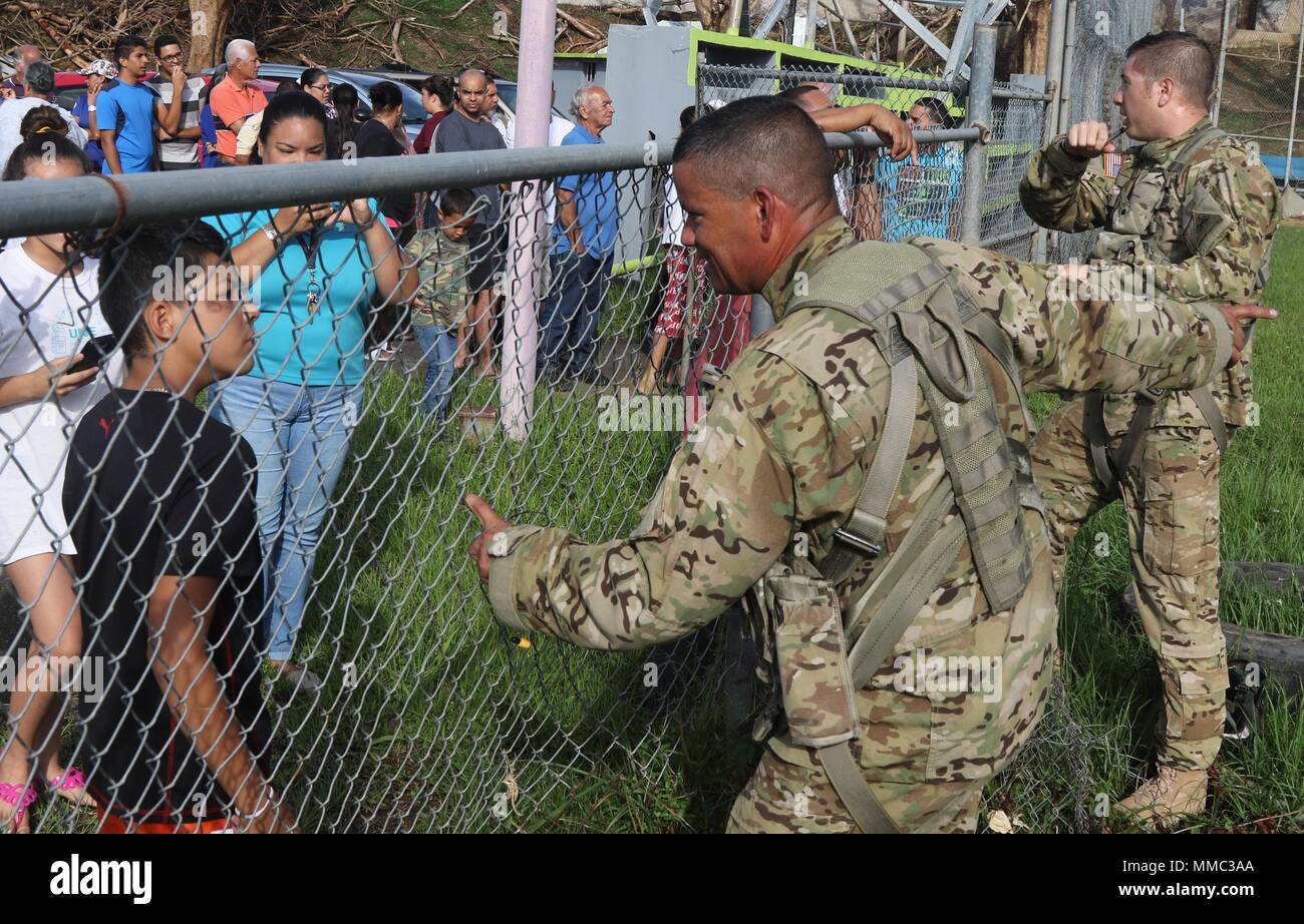 Sgt. First Class Eladio Tirado of Carolina, Puerto Rico speaks with ...
