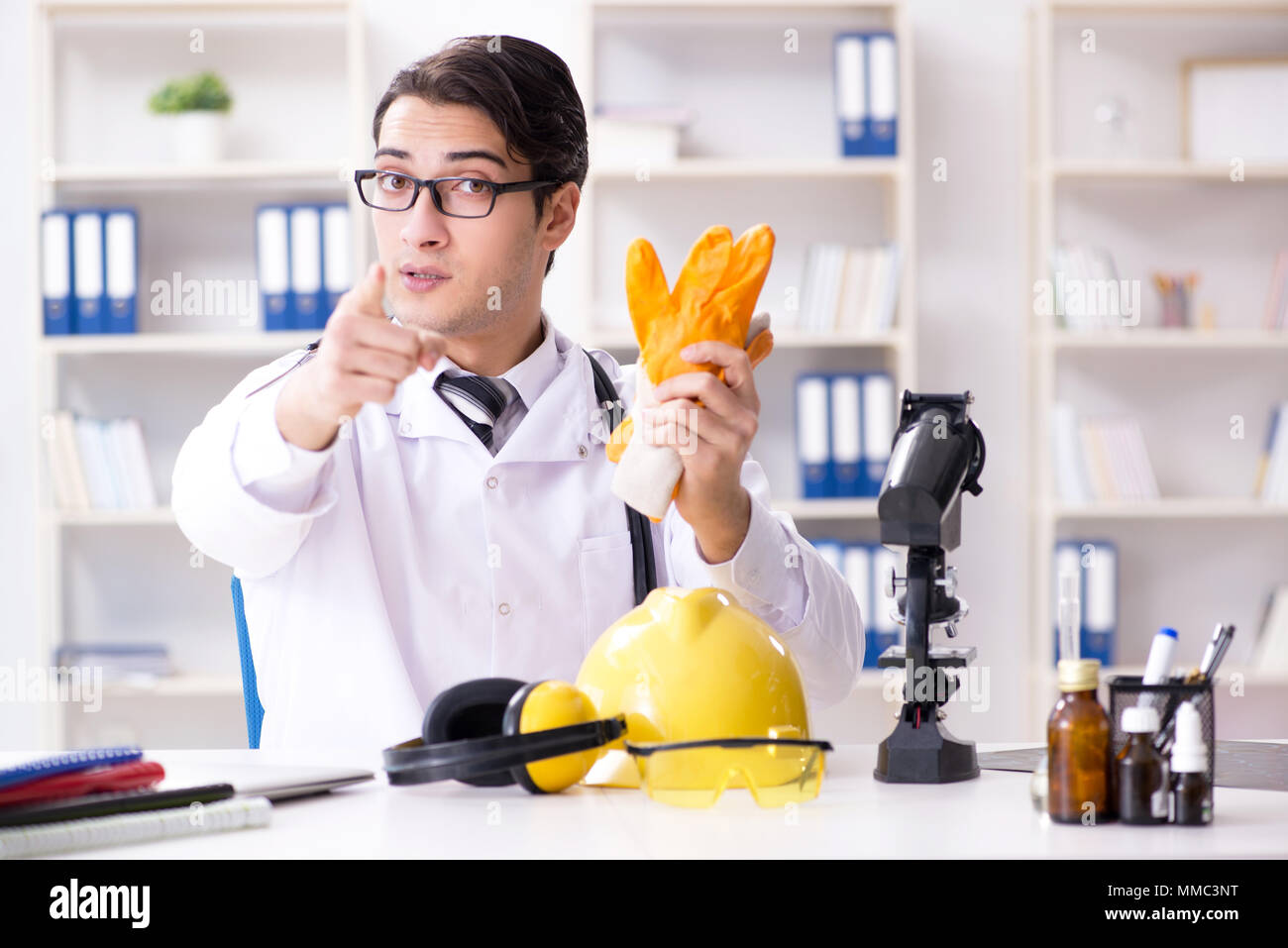 Safety doctor advising wearing hi-res stock photography and images - Alamy