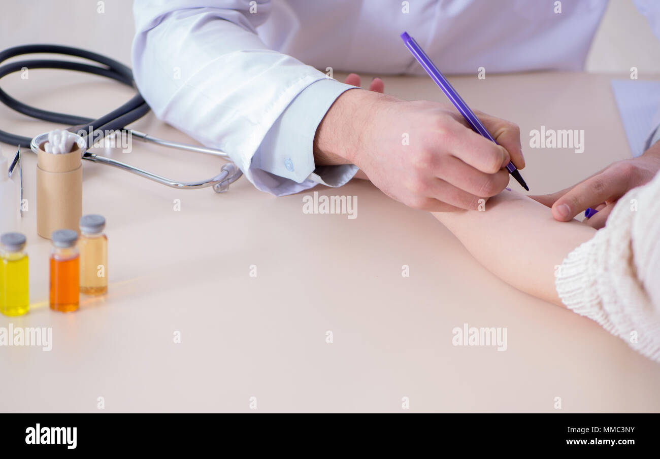 Doctor testing allergy reaction of patient in hospital Stock Photo - Alamy