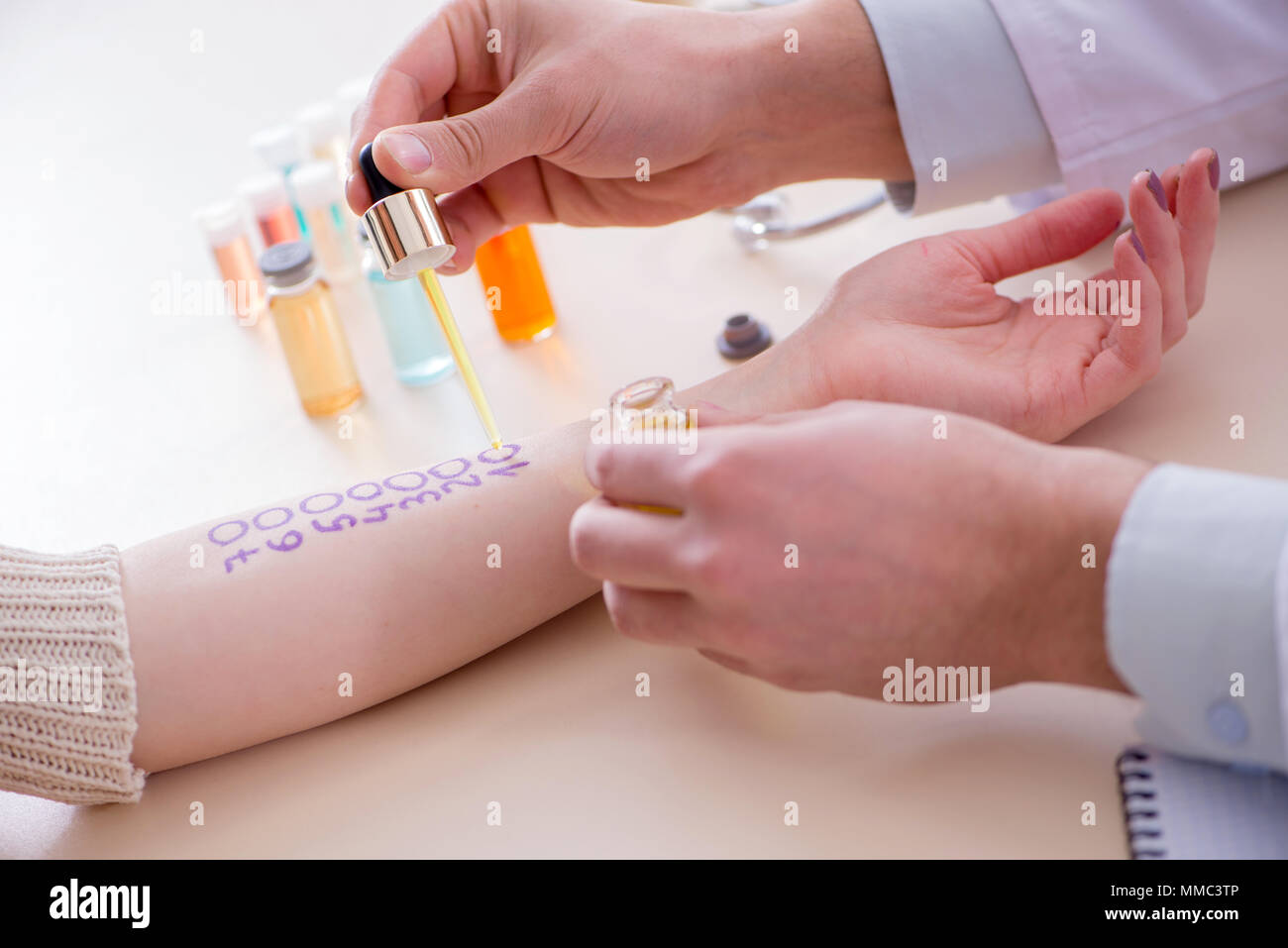 Doctor testing allergy reaction of patient in hospital Stock Photo - Alamy