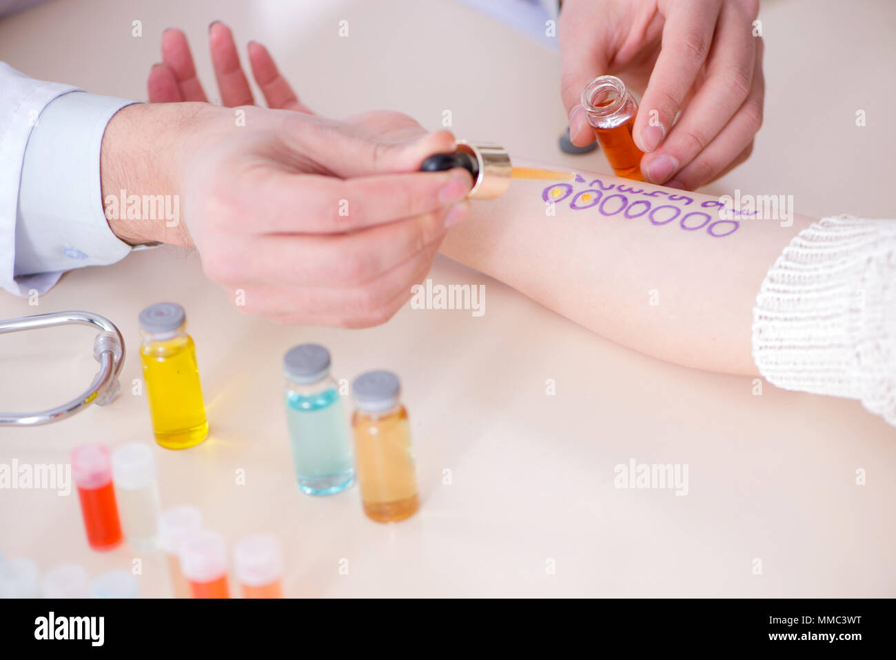 Doctor testing allergy reaction of patient in hospital Stock Photo - Alamy