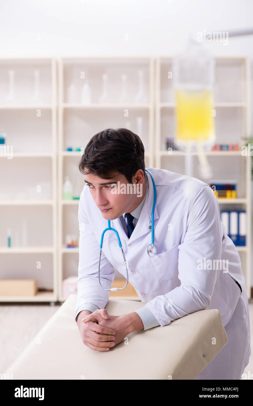 Doctor with bag of blood plasma in hospital Stock Photo - Alamy