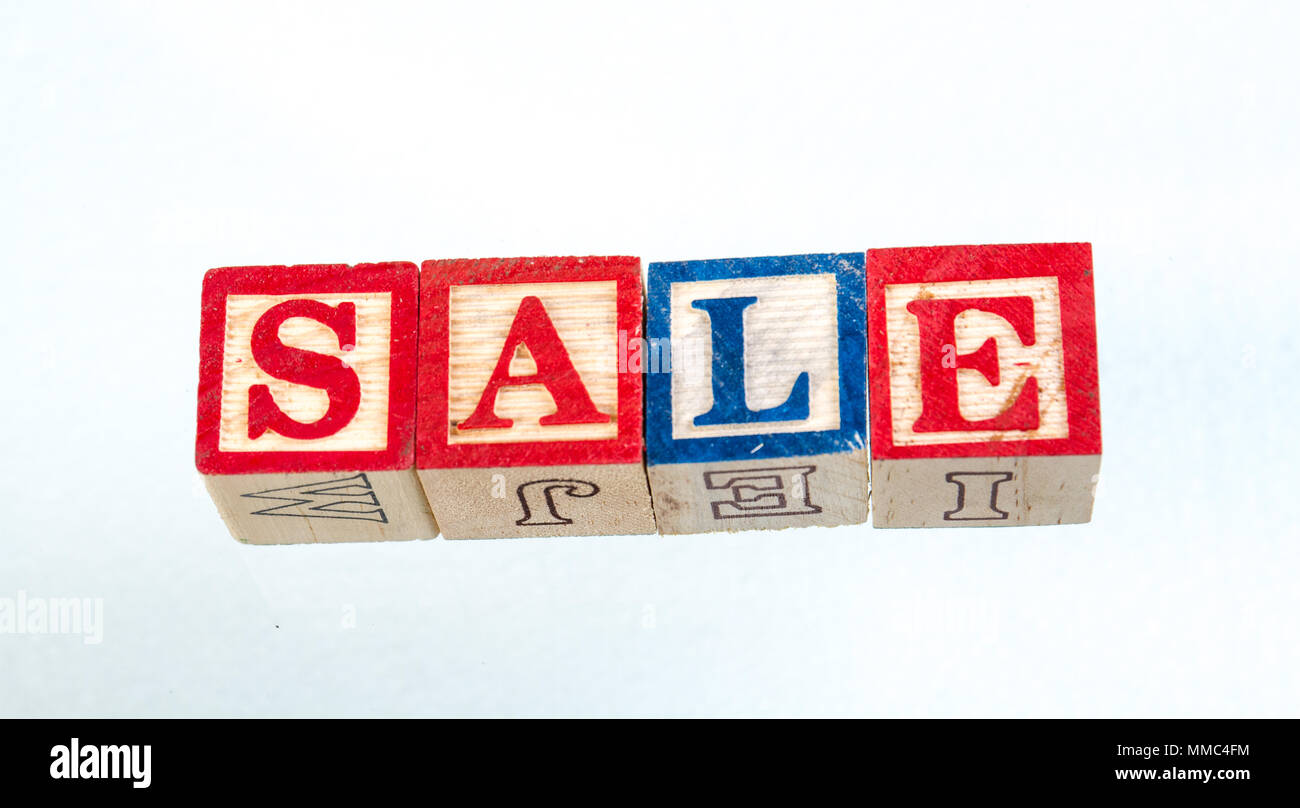 The phrase sale visually displayed on a white background using colorful ...