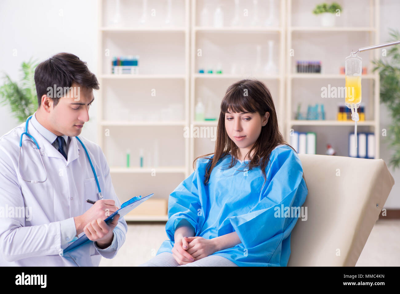 Doctor discussing blood transfusion with patient Stock Photo - Alamy