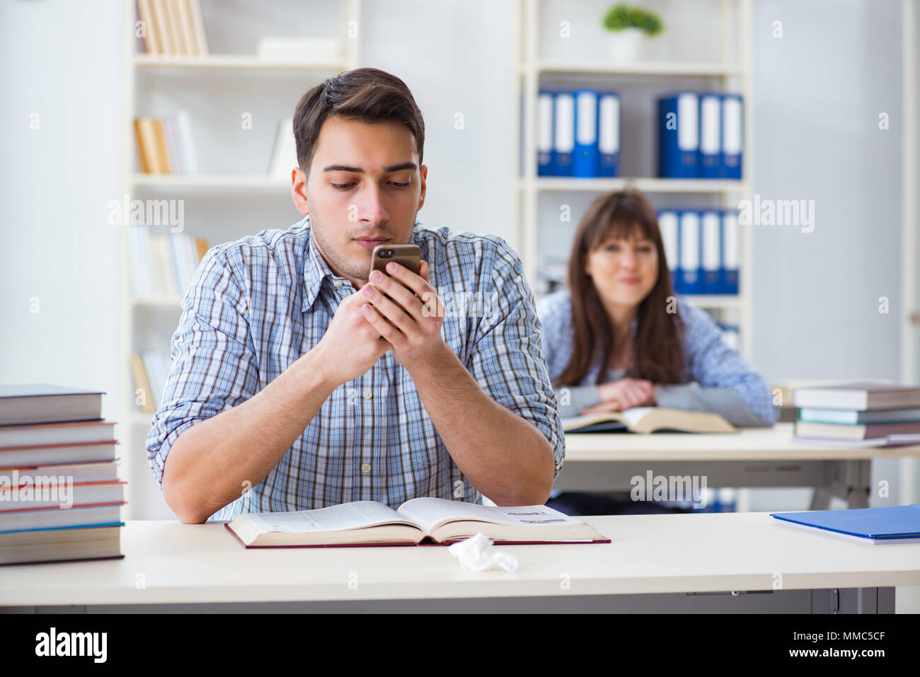 Students sitting and studying in classroom college Stock Photo - Alamy