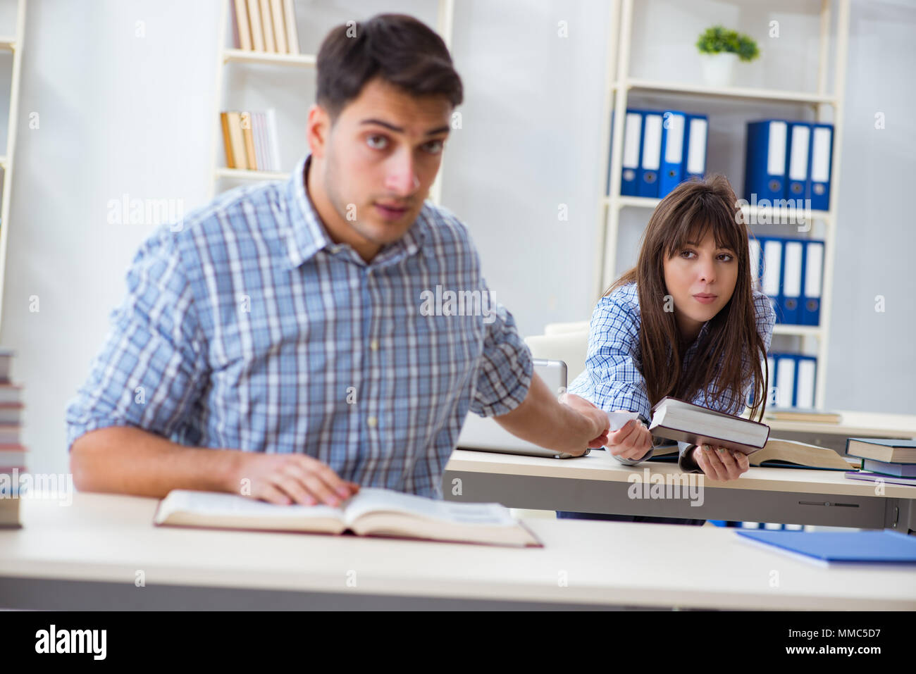 Students sitting and studying in classroom college Stock Photo - Alamy