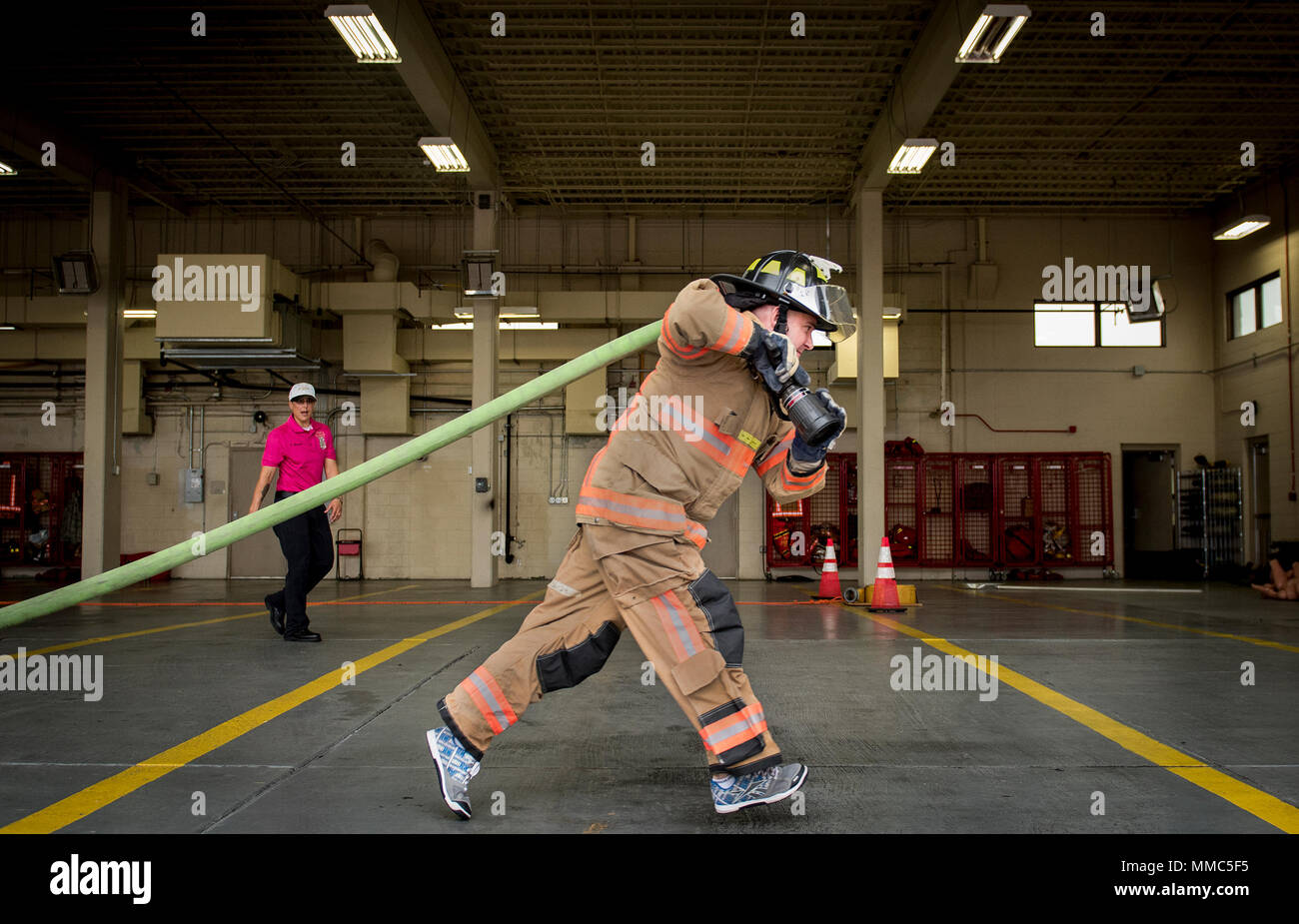 Dragging hose hi-res stock photography and images - Alamy