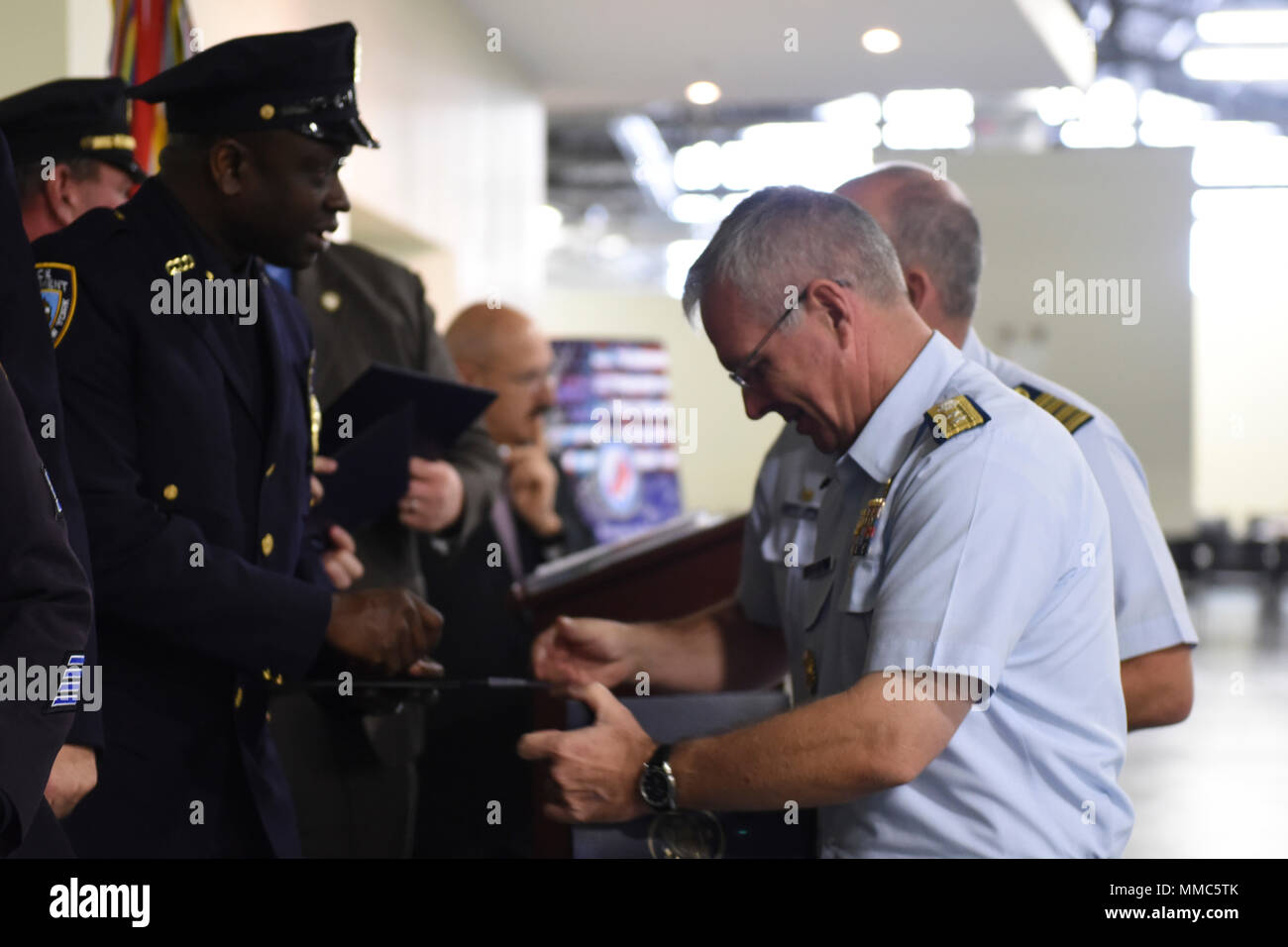 Commander coast guard first district hi-res stock photography and ...