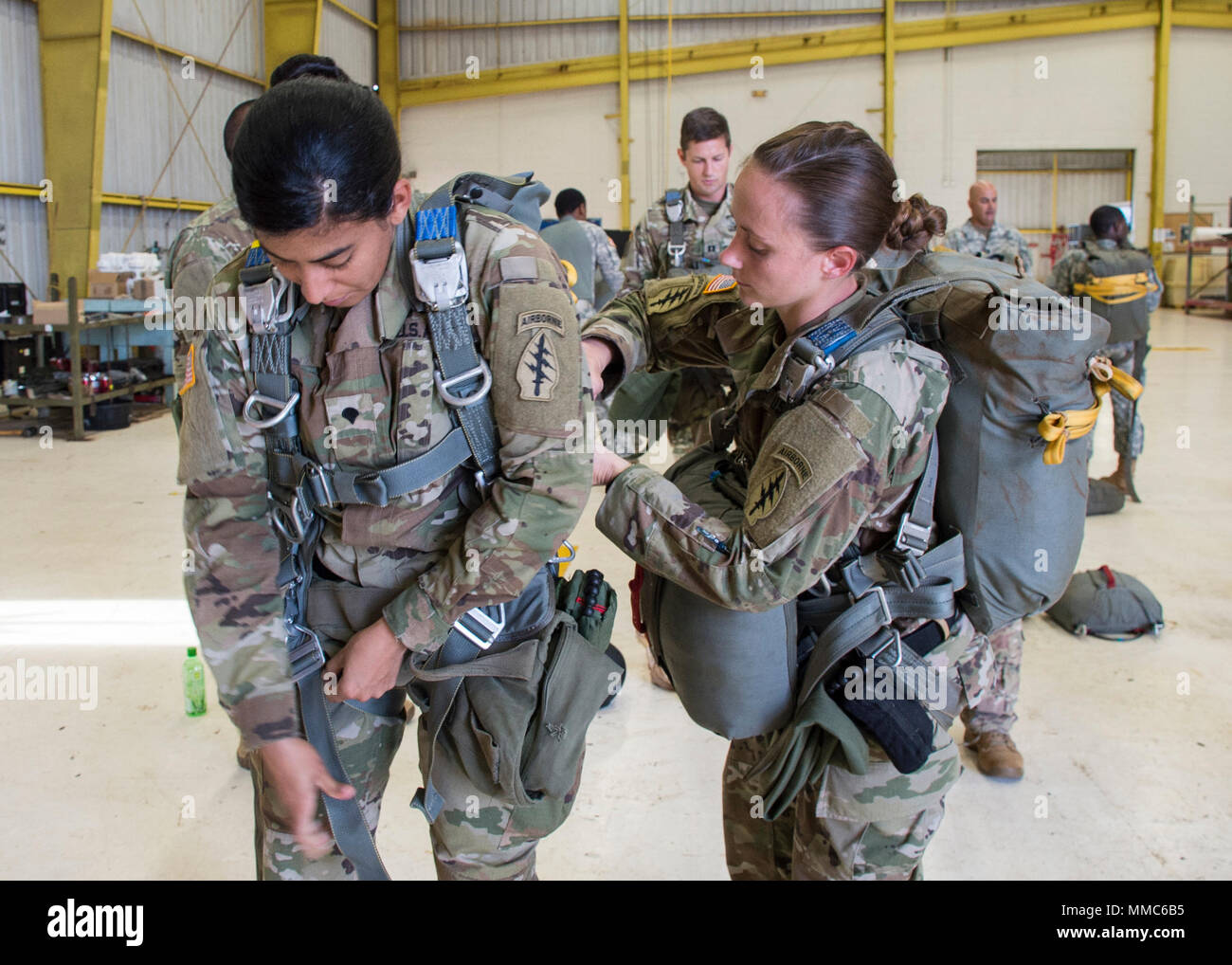 WHEELER ARMY AIRFIELD, Hawaii – Staff Sgt. Jessica Suarez (right ...