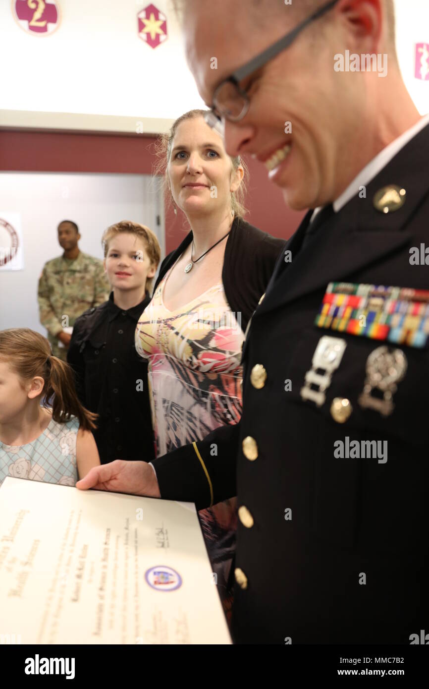 Army Staff Sgt. Robert Eccles and family beam with pride after he was ...
