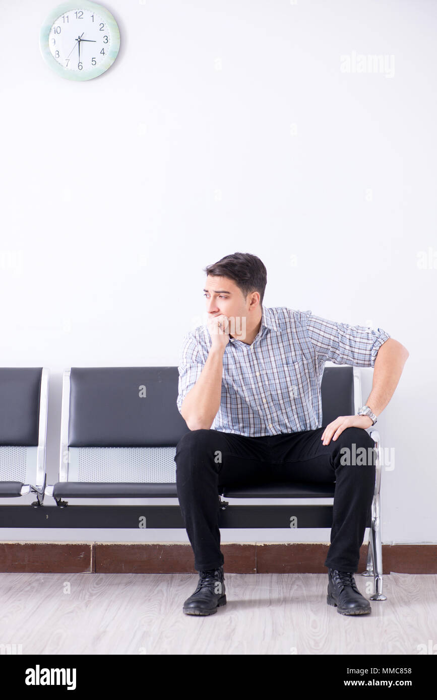 Frustrated businessman waiting in airport hi-res stock photography and ...