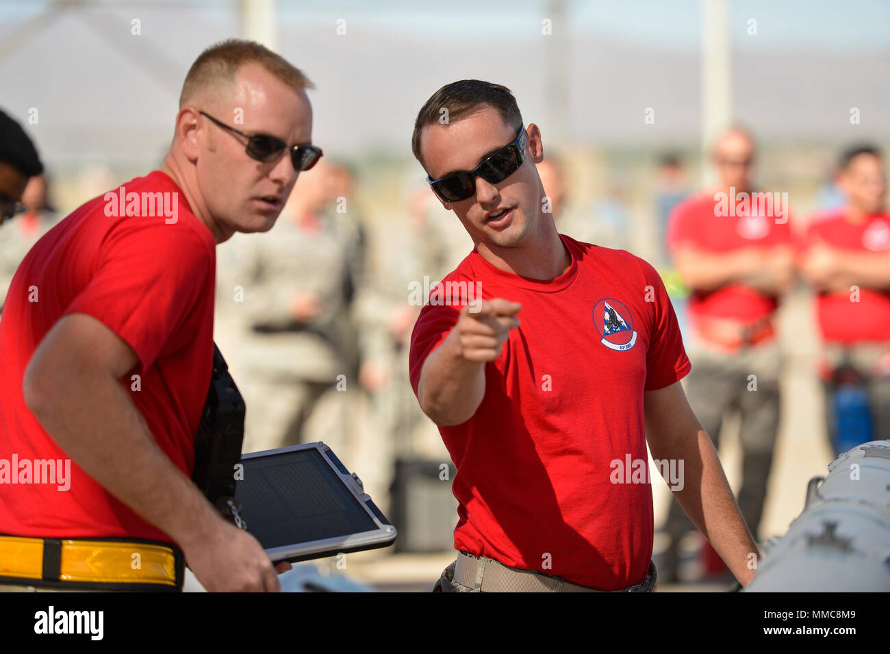 Senior Airman Jason Hansford (Right), 63rd Aircraft Maintenance Unit ...