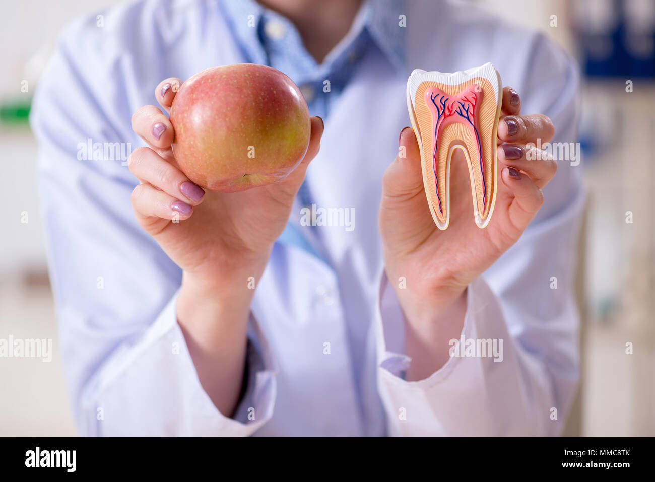 Dentist practicing work on tooth model Stock Photo - Alamy