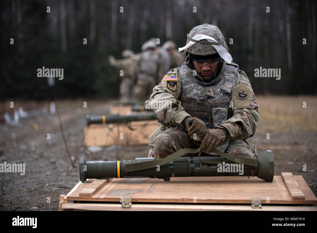 Army Sgt. Derek Lawson, assigned to the 109th Transportation Company ...
