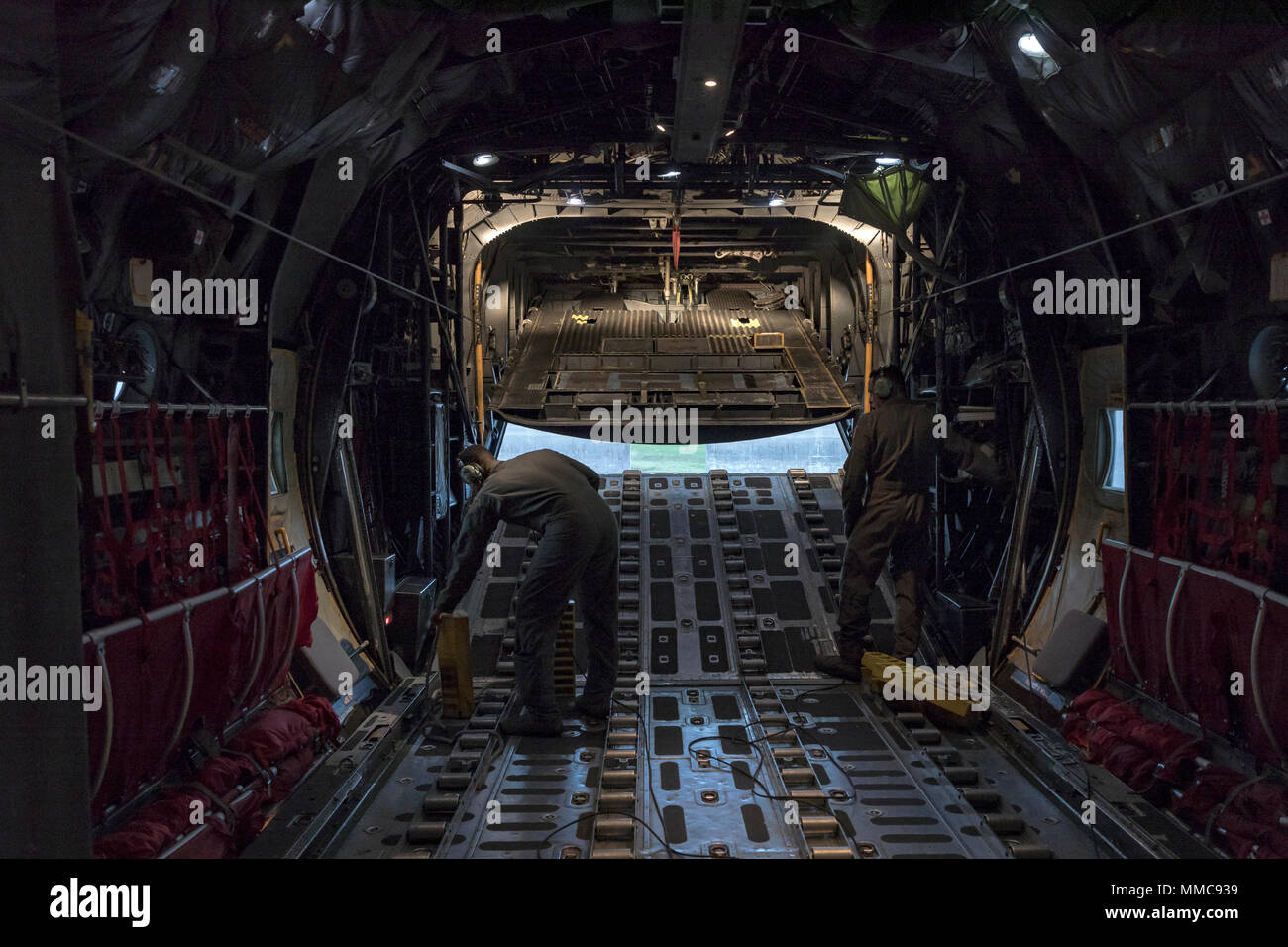 The rear ramp of a C-130H Hercules closes after landing at Yokota Air ...